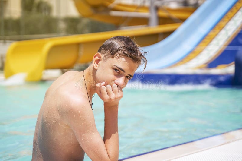 View from the Side of a Handsome Boy at the Edge of the Pool Stock ...