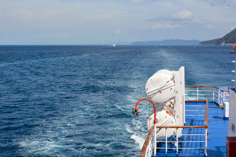 View from the Side of a Sea Ship on the Blue Sea and the Waves Behind ...