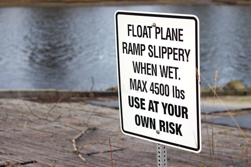 View of Sign Float Plane Ramp Slippery when Wet, Use at Your Own Risk ...
