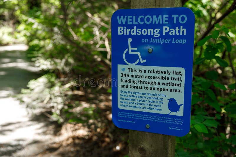 View of Sign Welcome To Birdsong Path on Juniper Loop Inside the ...