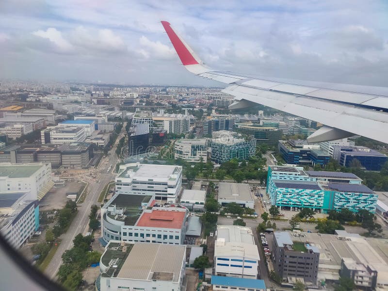 View of Singapore from a Landing Airplane Out the Window at Cloudy Day ...
