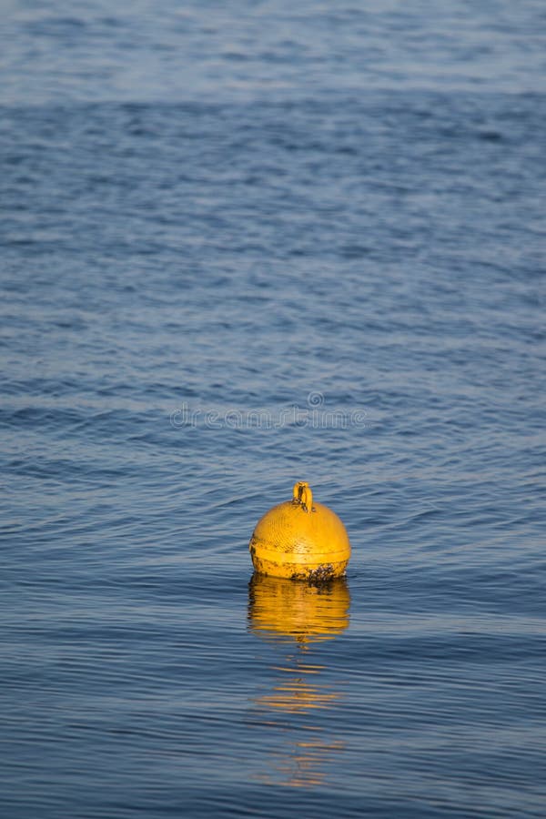 Yellow warning buoy stock image. Image of sign, sailing - 105969115
