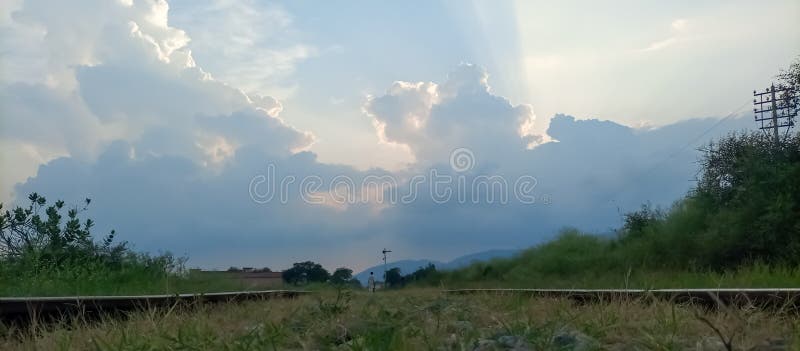 View of Sky with Clouds from Ground Angle, Sun Rays, Sunset Time Stock ...