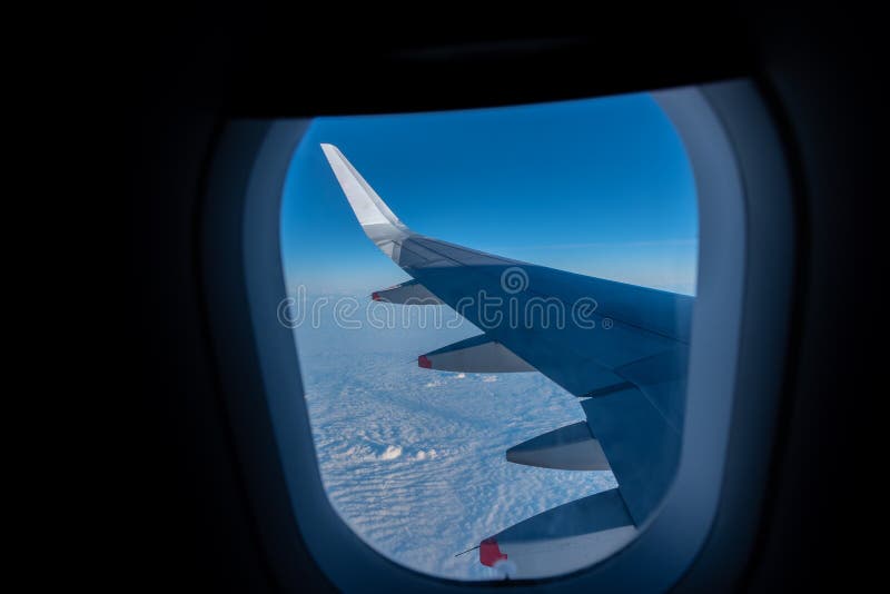 View of the Sky from Inside an Airplane in Flight. Stock Photo - Image ...