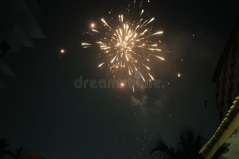 Sky Shot Beautifully Blasted in Golden Colour Displaying a Flower Shape ...