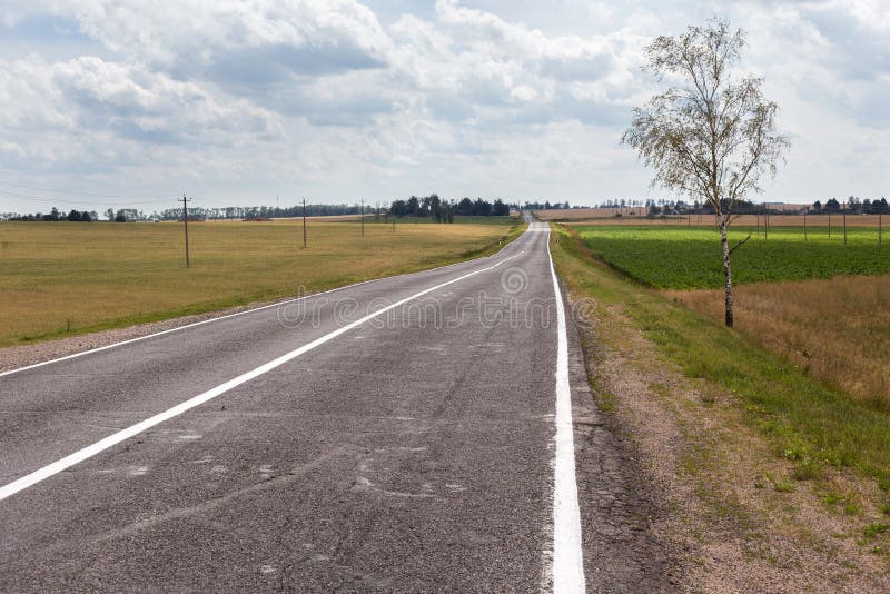 View of the Small Asphalt Road in the Countryside with Blue Sky. Stock ...