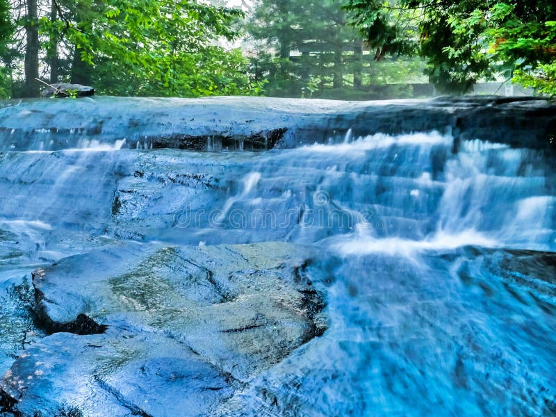 Bridge in the Mist Over Shallow Cascade Stock Image - Image of flowing ...