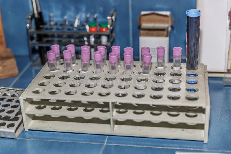 View of a Group of Laboratory Tubes with Red Plugs Stock Image - Image ...