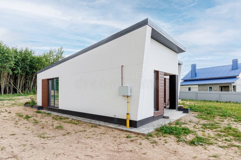 View of a Small Modern House Immediately after Construction. Step House ...