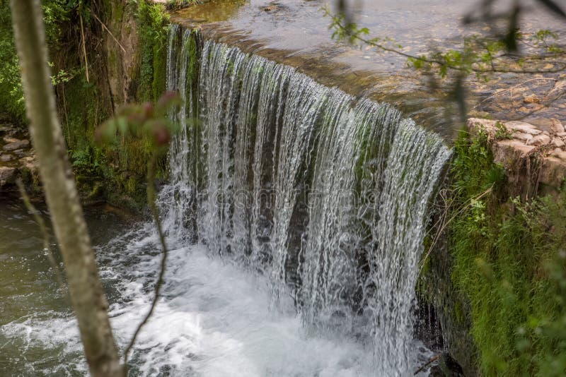 View of Small Waterfall on River with Detail of Water Foam, Rocks and ...