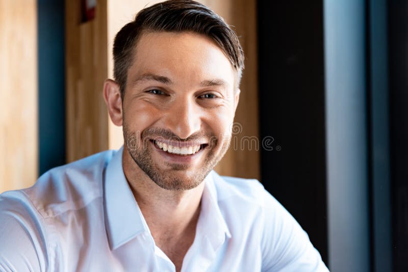 View of Smiling Handsome Man Looking at Camera in Cafe Stock Image ...