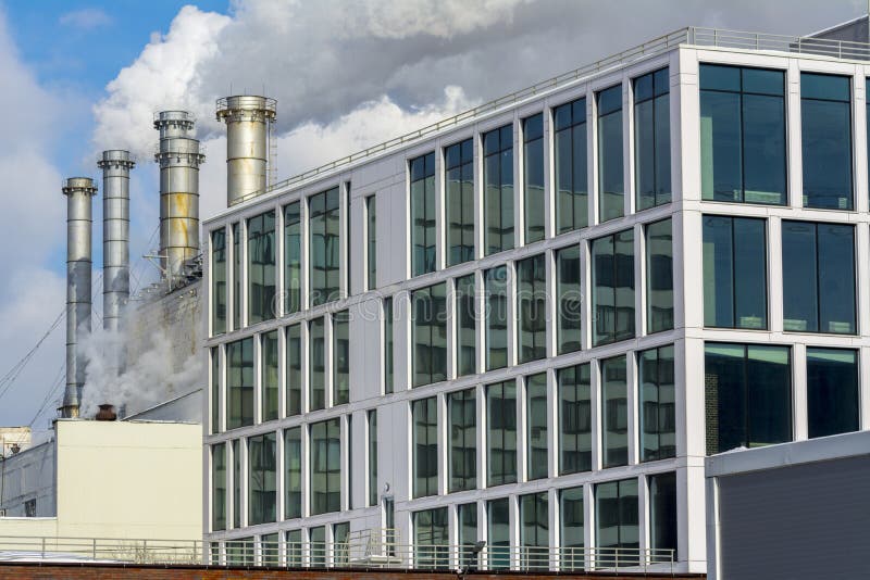 Smoking Factory Pipes and Office Building of the Factory Stock Image ...
