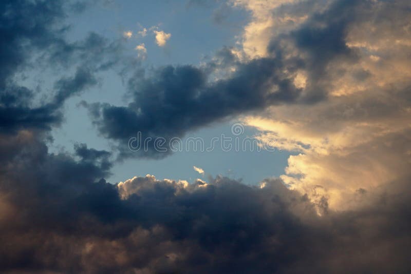 GREY CLOUDS at SUNSET with HIGHLIGHTS and FAINT GLOW Stock Photo ...