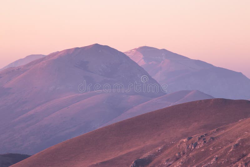A View of Some Mountains Top, with Beautiful, Warm Sunset Colors Stock ...