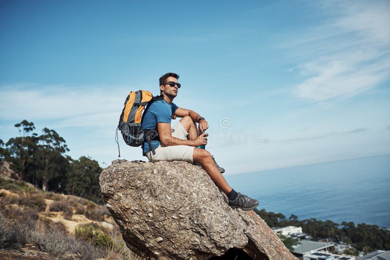 This View is Something Else. a Carefree Young Man Taking a Quick Break ...