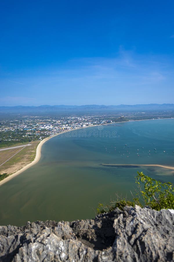 A View of the Sparkling Blue Ocean from a Sandy Beach, with a Clear Sky ...