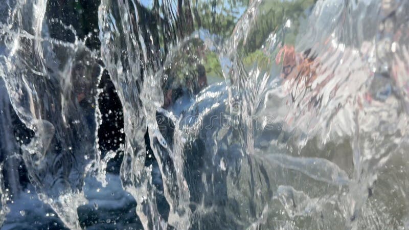 View through Splashes of Water Flow Stock Video - Video of people ...