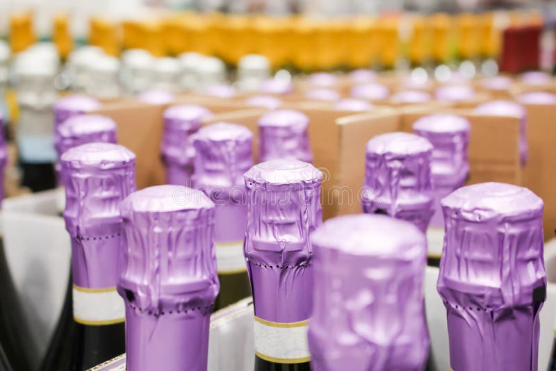 Foil Wrapper Sparking Wine Bottle Tops at Store Stock Image - Image of ...