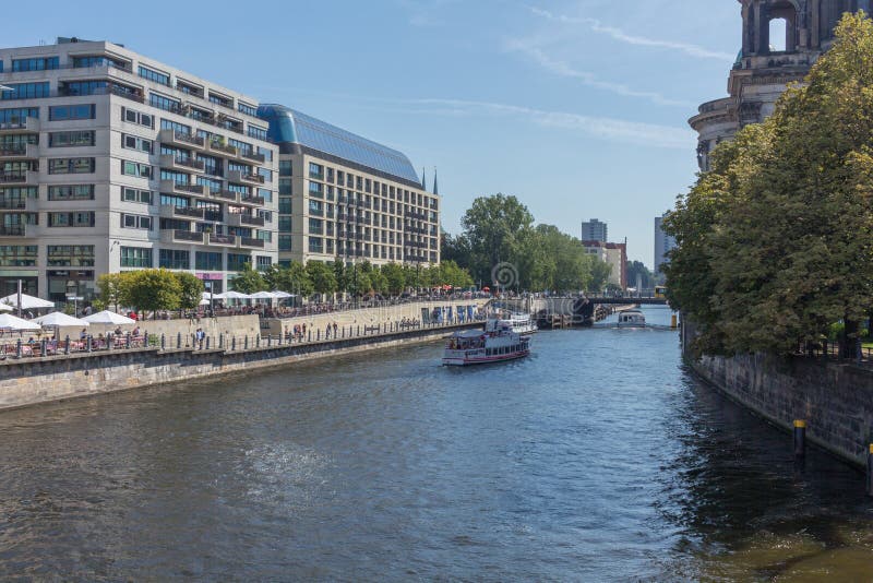View of the Spree River, the Boats and the Buildings in Berlin, Germany ...