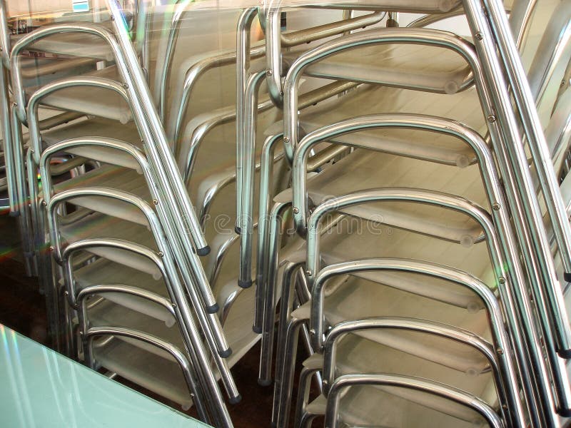 View of a Stack of Aluminium Chairs Stock Photo - Image of building ...