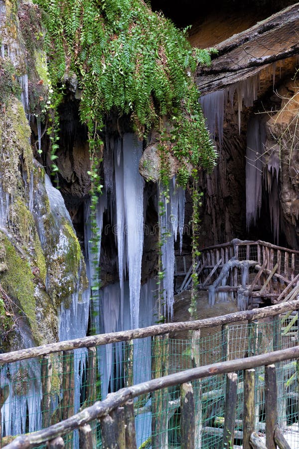 View of Stalactites and Stalagmites of Ice at the Entrance of a Cave ...