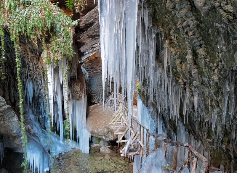 View of Stalactites and Stalagmites of Ice at the Entrance of a Cave ...