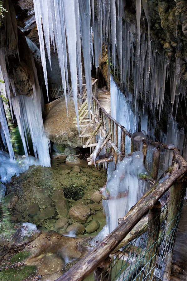View of Stalactites and Stalagmites of Ice at the Entrance of a Cave ...