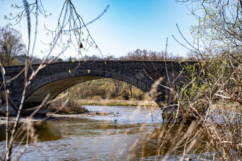 View of the Stone Bridge at Etienne Brule Park in Toronto Stock Photo ...