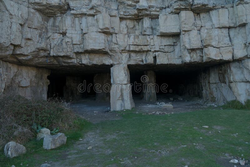 View of a Stone Cave with Big Rocks Stock Image - Image of ancient ...