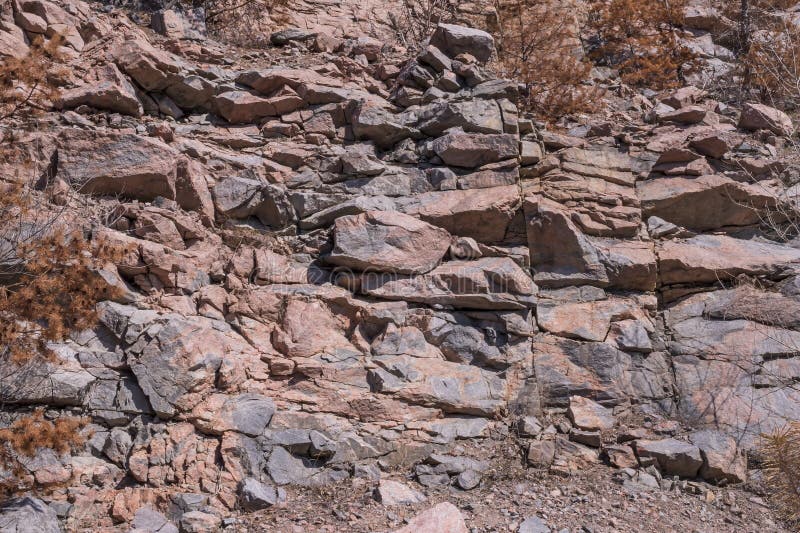 View of the Stone Cliff of a Granite Quarry. Large Stones. Stone Layers ...