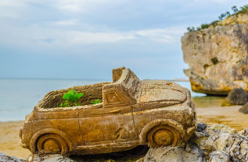 View of a Stone Flower Pot in Shape of Car...IMAGE Editorial Photo ...