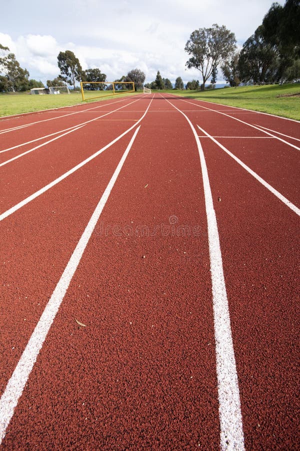 View Straight Down a Running Track Stock Photo - Image of racetrack ...