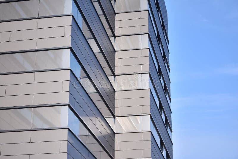A View at a Straight Facade of a Modern Building with a Dark Grey ...