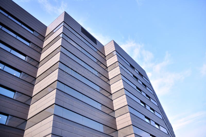 A View at a Straight Facade of a Modern Building with a Dark Grey ...