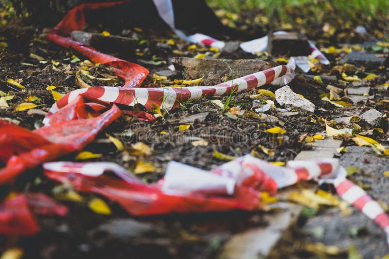 View of Stripped Warning Tape on the Ground at Fall Stock Photo - Image ...