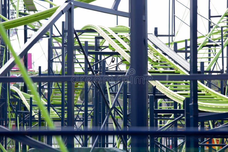 Blue green roller coaster stock image. Image of loop - 254814367