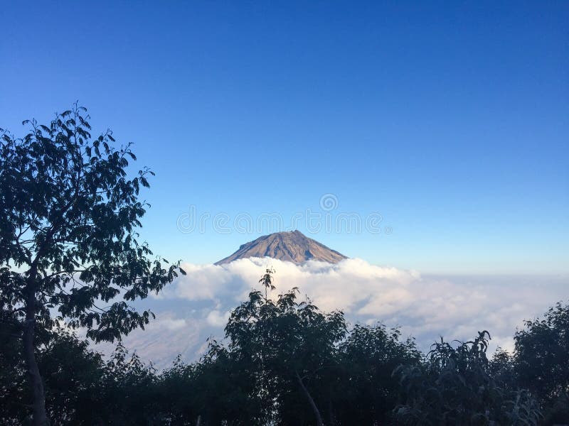 The View of Sumbing Peak from Sindoro Mount Stock Photo - Image of dusk ...