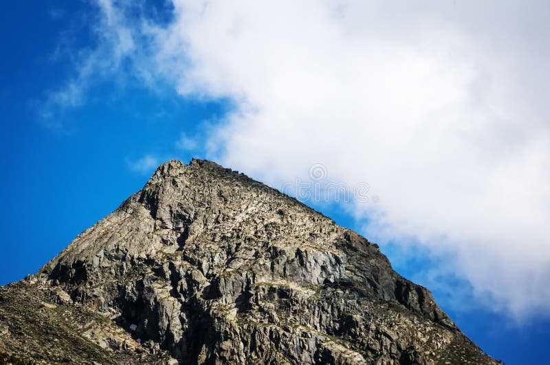 View of the Summit on a Blue Sky Background with White Clouds Stock ...