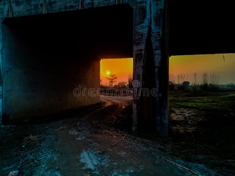 View of Sun Setting from Under the Bridge. Stock Photo - Image of view ...