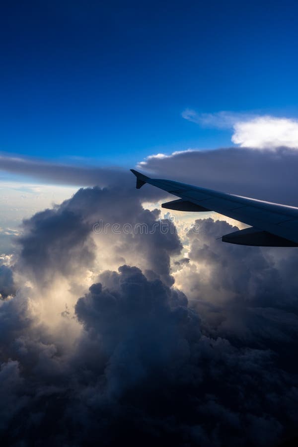View the Sunrise and Clouds from the Flight Window Stock Photo - Image ...