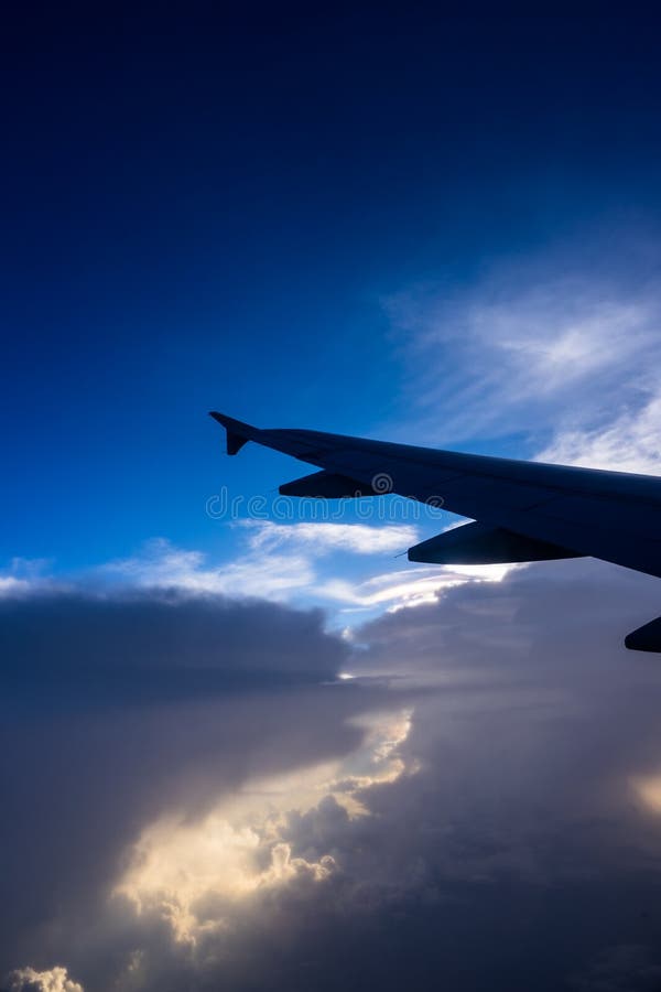 View the Sunrise and Clouds from the Flight Window Stock Photo - Image ...