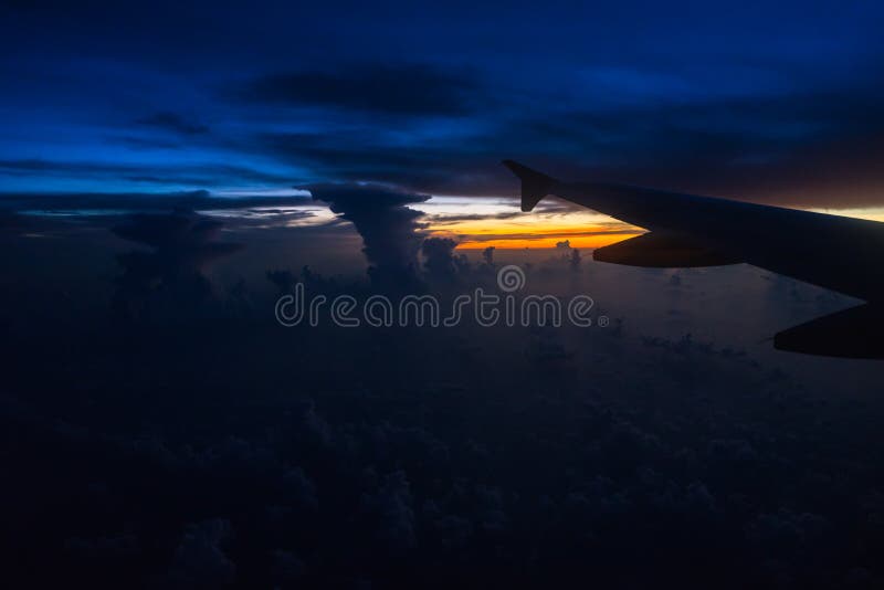View the Sunrise and Clouds from the Flight Window Stock Photo - Image ...