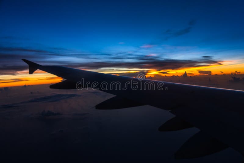 View the Sunrise and Clouds from the Flight Window Stock Photo - Image ...