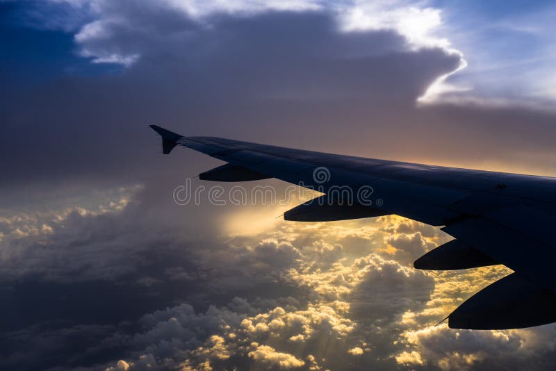 View the Sunrise and Clouds from the Flight Window Stock Photo - Image ...