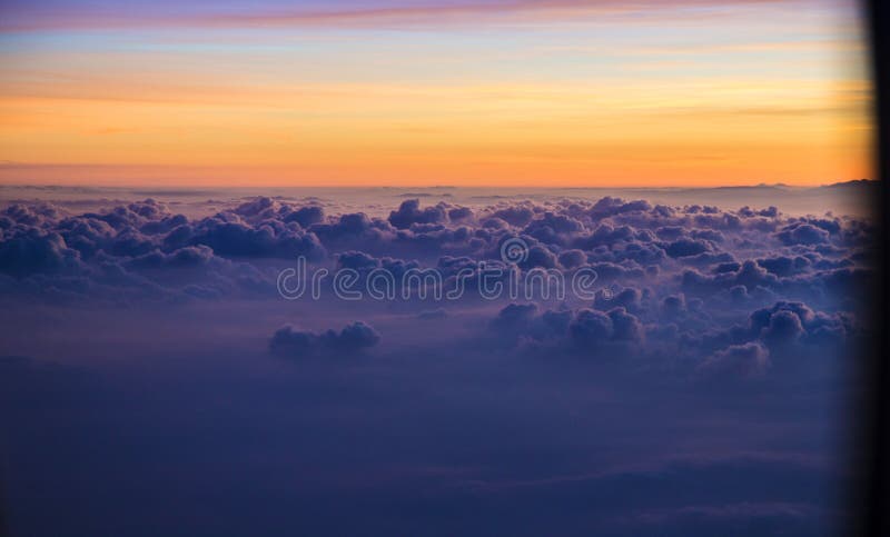 View of a Sunrise Full of Color Stock Photo - Image of flying, high ...