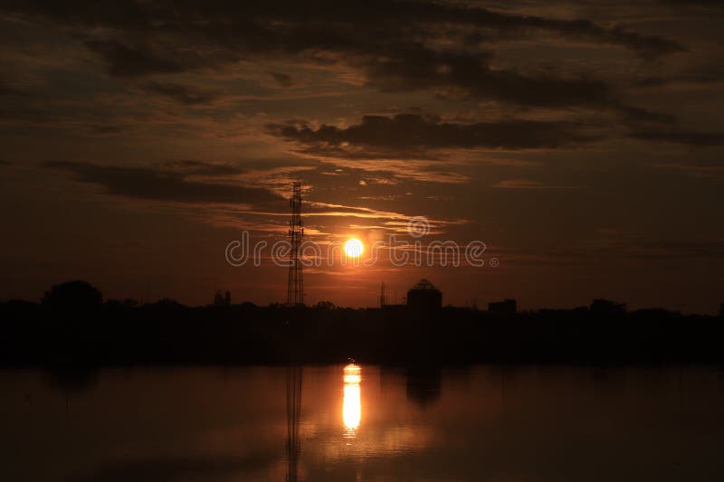 View of the Sunset Sky and the Sun Soon Setting on a Lake Stock Photo ...