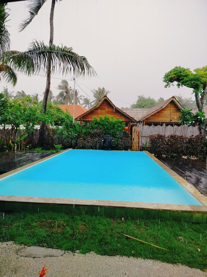 A View of the Swimming Pool in the Rain Stock Image - Image of view ...