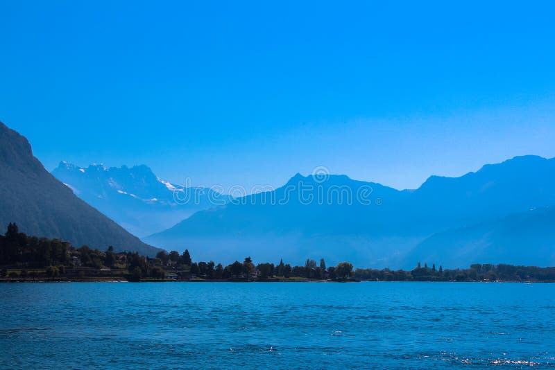 View of the Swiss Alps stock image. Image of water, switzerland - 41054525