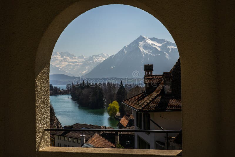 A Swiss Window with Flowers Below Large Eave Stock Image - Image of ...