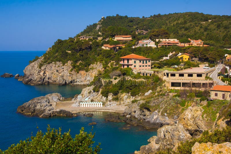 Talamone Rock Beach and Medieval Fortress at Sunset. Maremma Argentario ...